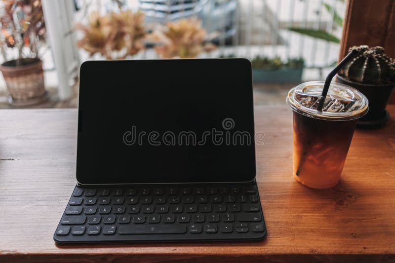 Working Tablet Computer in Coffee Cafe. Concept of Freelance Creative ...