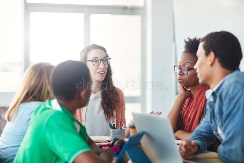 Working on Their Group Project. a Group of University Students Working ...