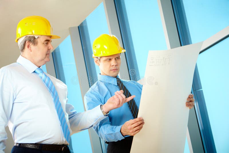 Engineers Talking at Office Stock Image - Image of blueprint ...