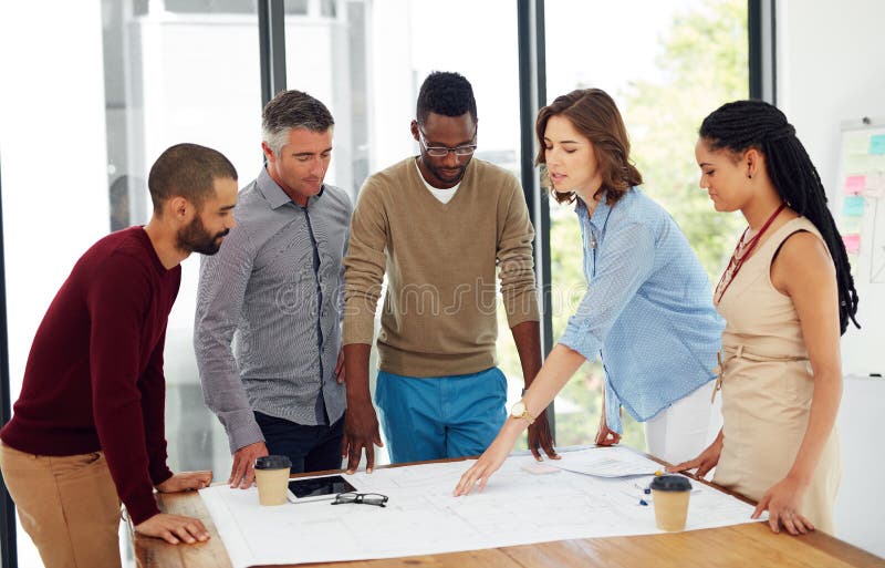 Working Together As a Team for a Common Cause. a Group of Architects in ...