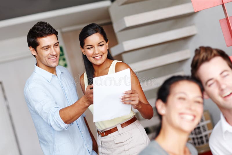 Working Together in the Office. Two Creative Directors Discussing a ...