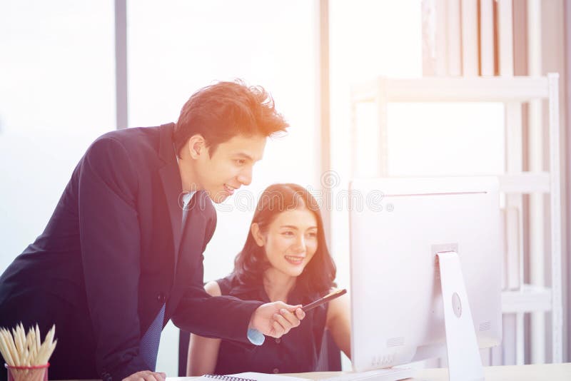 Working Together on Project. Startup Business Partners Working Together ...