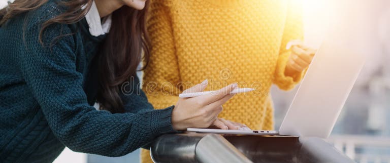 Working Together on Project. Two Young Business Colleagues Working on ...