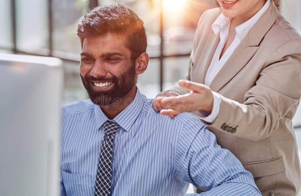 Working Together on Project. Two Young Business Colleagues Working on ...