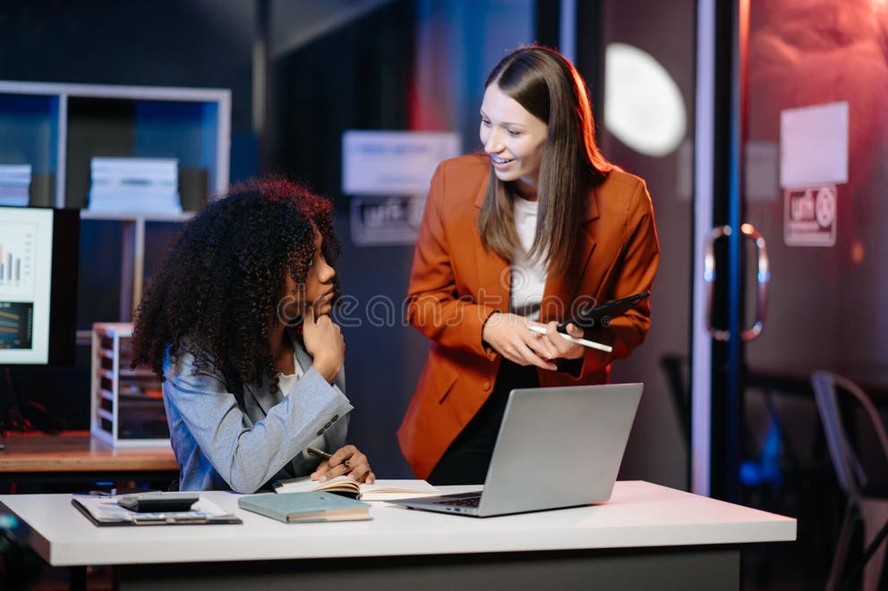 Working Together on a Project Two Young Business Colleagues Working on ...