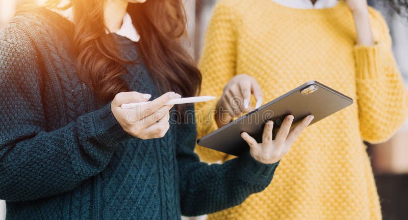 Working Together on Project. Two Young Business Colleagues Working on ...