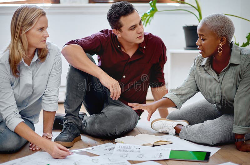 Working Together on Their Latest Creative Campaign. a Group of ...