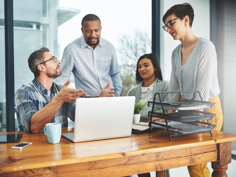 Working Together To Get the Task Done. Businesspeople Working Together ...