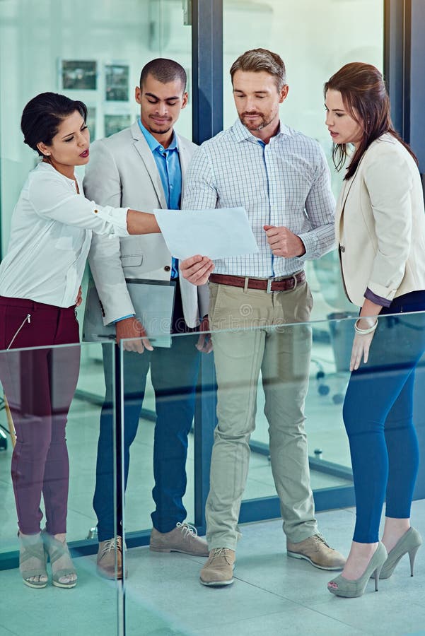 Working Together Towards the Same Goal. a Group of Coworkers Talking ...