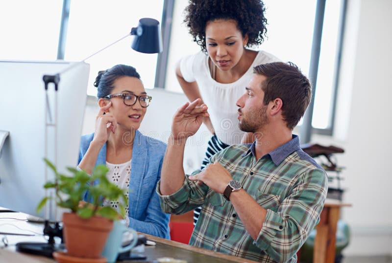Working Together Towards Their Vision. Colleagues Having a Discussion ...