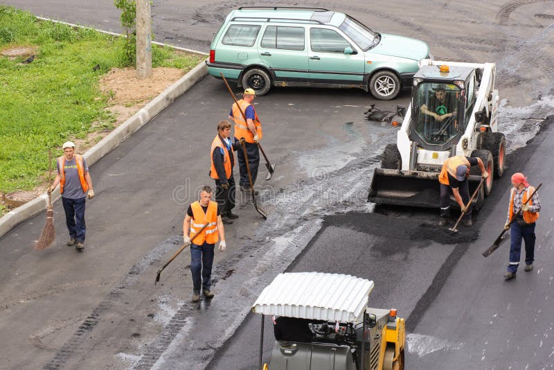 Working with a Tool for Road Works. Editorial Photo - Image of heavy ...