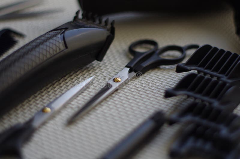 Working Tools of Barber Master. Hair Salon Table with Bokeh Effect ...