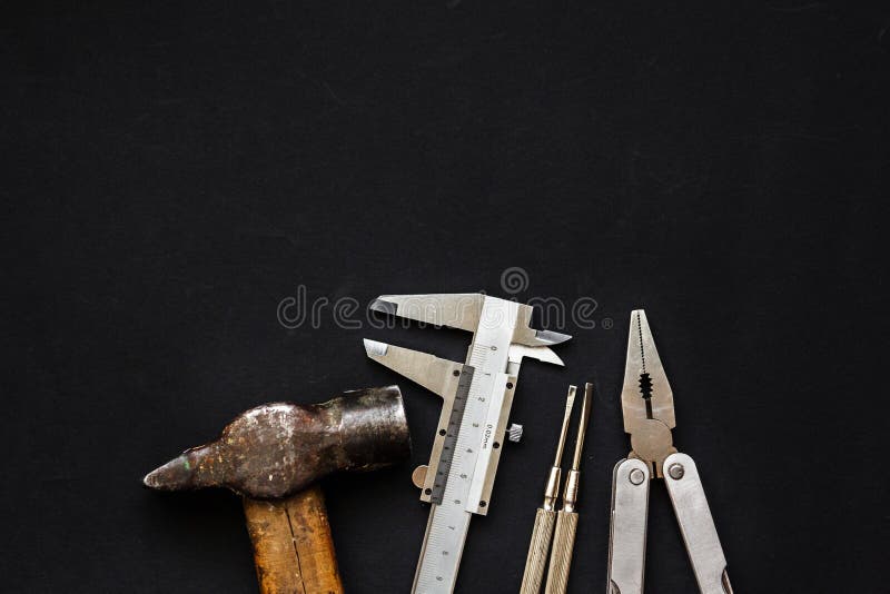 Working Tools on Black Background Top View. Tool Set and Instruments ...