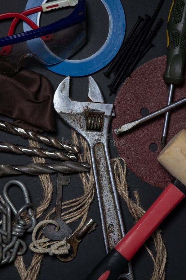 Working Tools On A Black Background. Used And Dirty Work Tools For Home ...