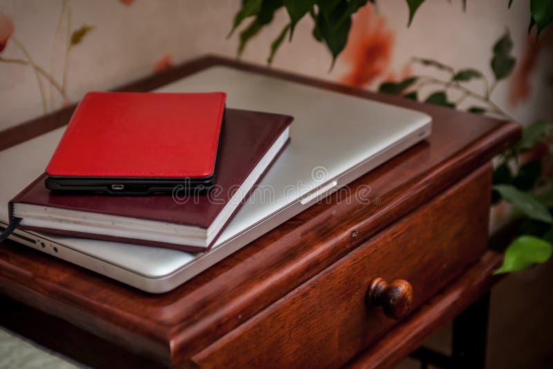 Working Tools of a Business Person, Notebook, E-book and Laptop Stock ...