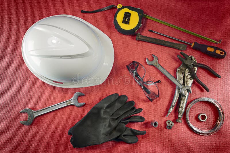 Working Tools on a Red Table Stock Image - Image of tools, safety ...