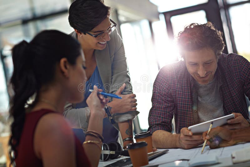 Working Towards a Common Goal. a Group of Colleagues Meeting in the ...