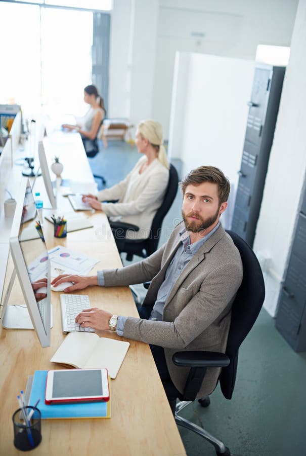 Working Towards a Successful Career. a Designer at Work in an Office ...