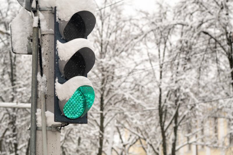 A Working Traffic Light on a City Street in Winter.the Traffic Light is ...