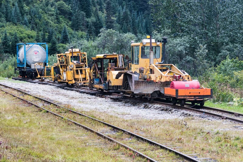 Working on the train gang stock image. Image of yellow - 79768147