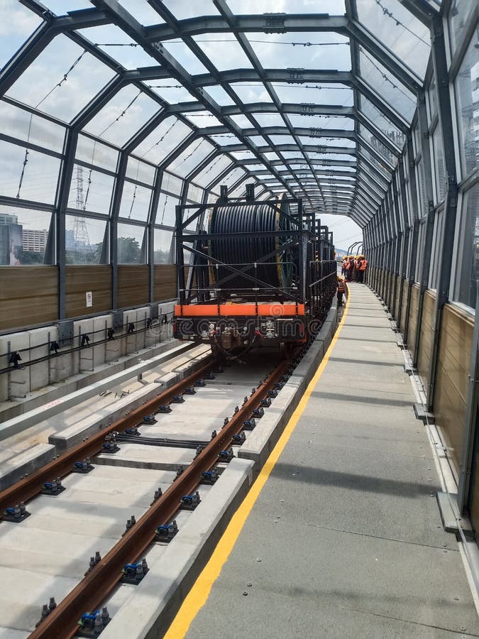 Working Train on Track with Cables Load Editorial Photography - Image ...