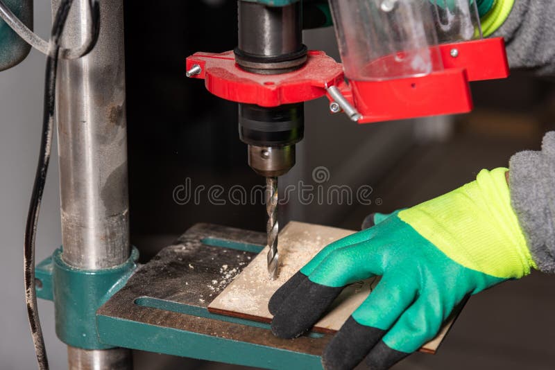 Working on Vertical Drilling Machines in the Industrial Plant Stock ...