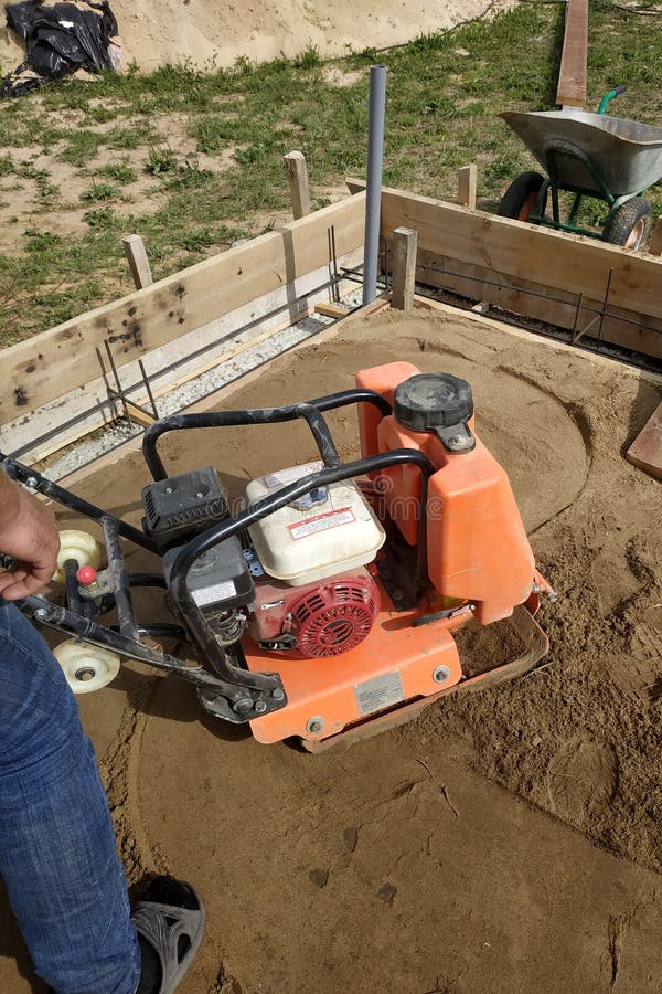 Working with a Vibrating Machine and Equipment, Soil Compaction with a ...