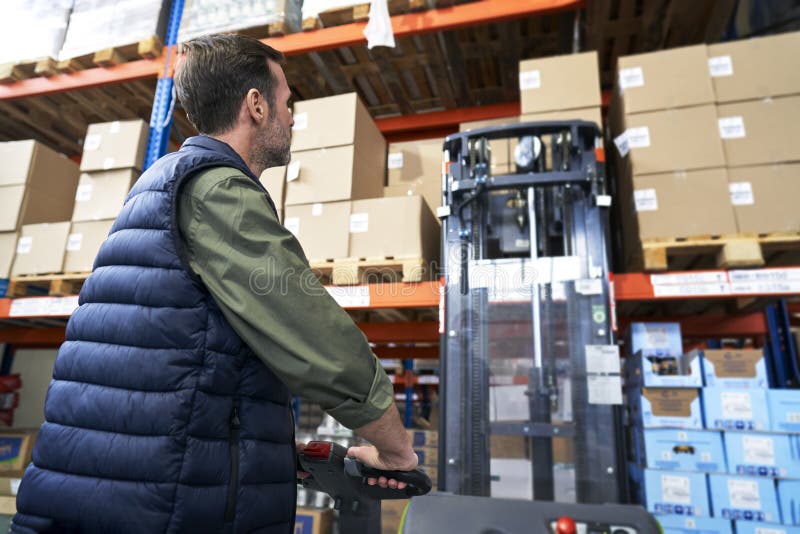 Working in warehouse stock photo. Image of rack, cart - 250003796