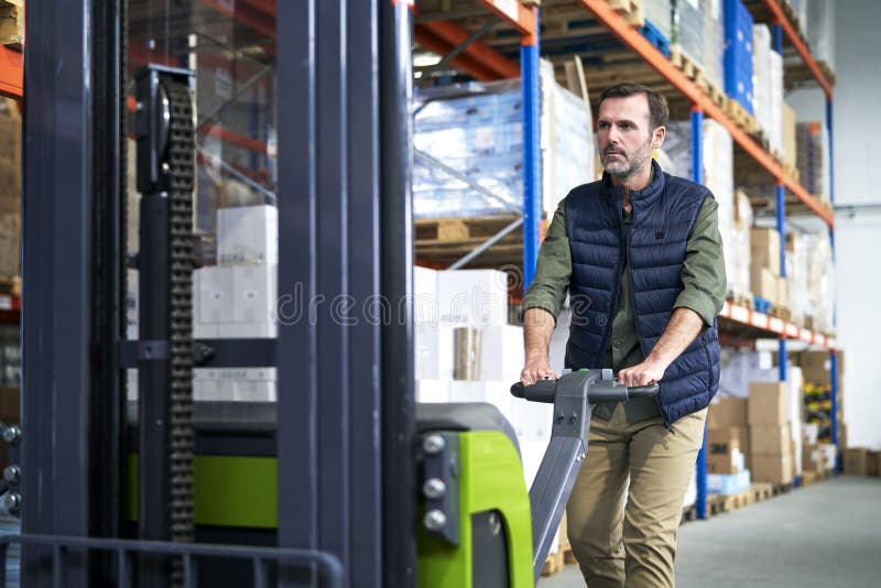 Working in warehouse stock photo. Image of occupation - 250003830