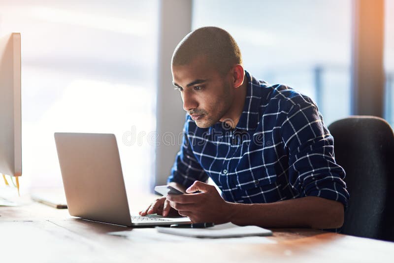 Working through Ways To Better Manage His Business. a Young Designer ...