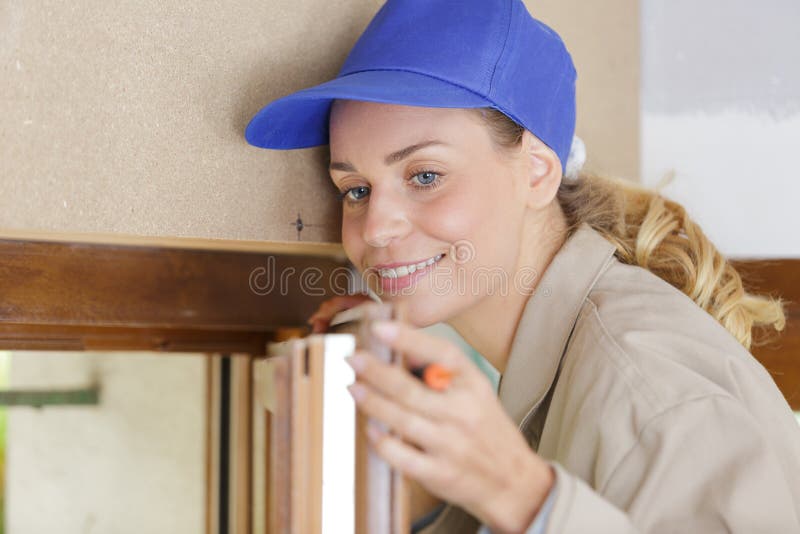 Working on window frame stock photo. Image of humanarm - 245861352