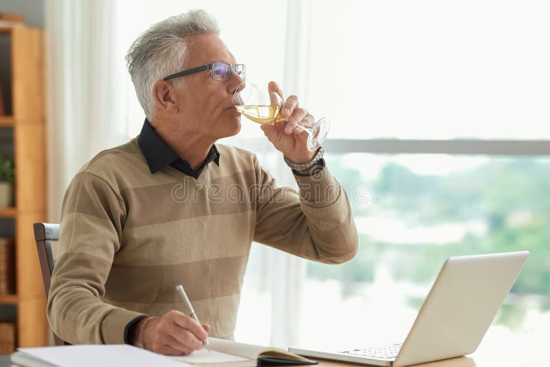 Working writer stock photo. Image of laptop, wine, elderly - 109465926