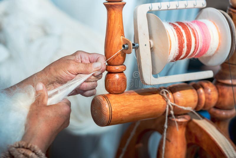 Working with Yarn on an Old Loom, Creating a Woolen Thread by Hand ...