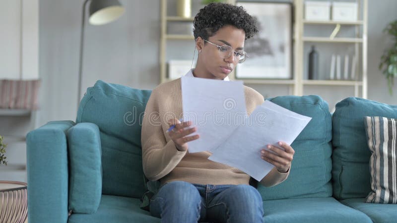 The Working Young African Girl Doing Paper Work Stock Photo - Image of ...