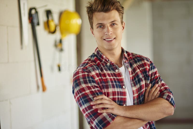 Working young man stock image. Image of clothing, tool - 79418101