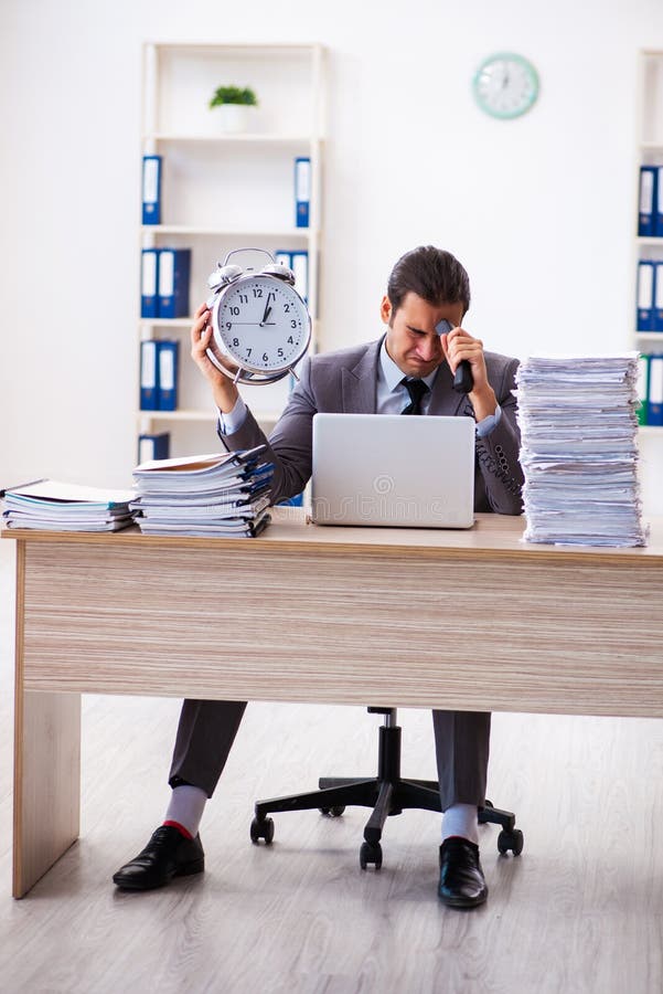 Workload Male Employee in Time Management Concept Stock Photo - Image ...