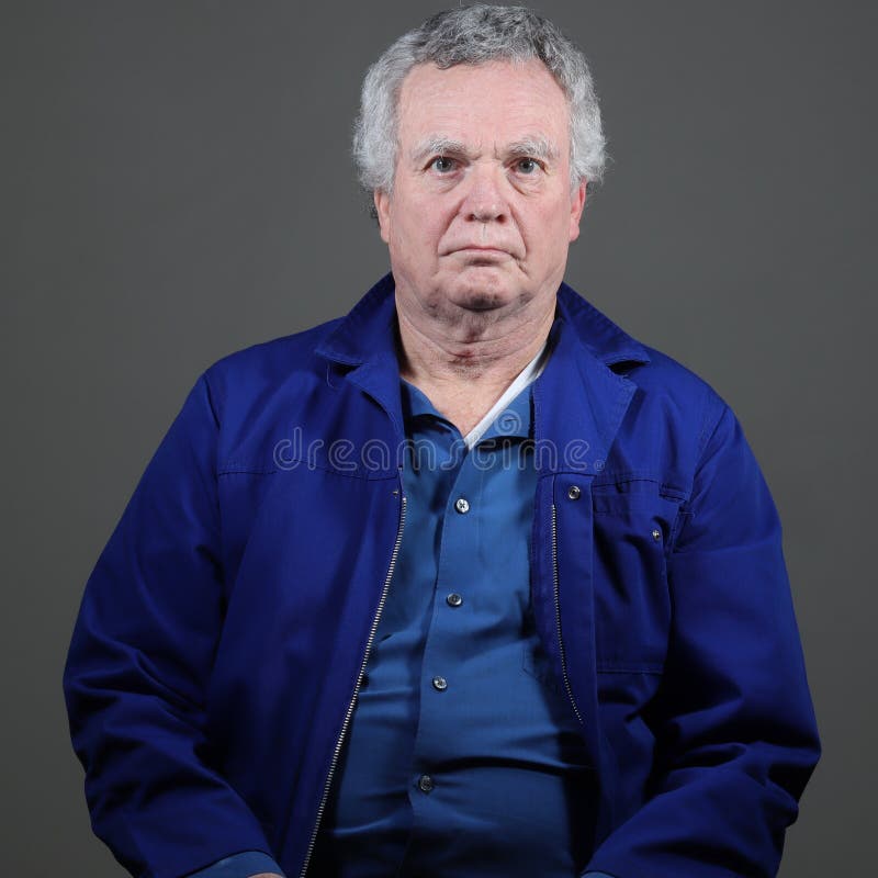 Workman in Blue Overalls: Portrait of an Elderly Skilled Worker Stock ...