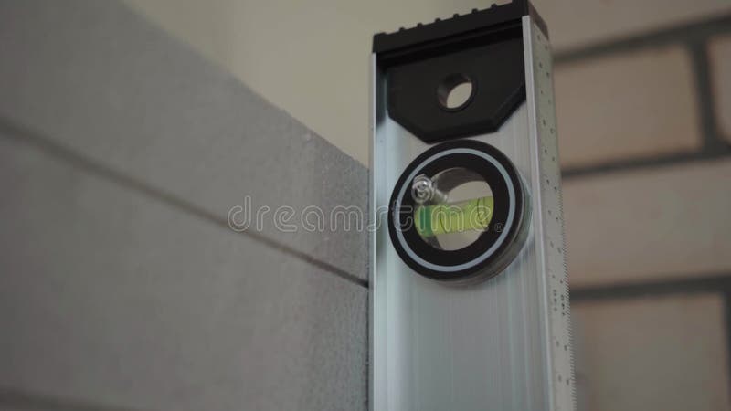 Workman Check Horizontal Level of Installing Insulate Plate with ...