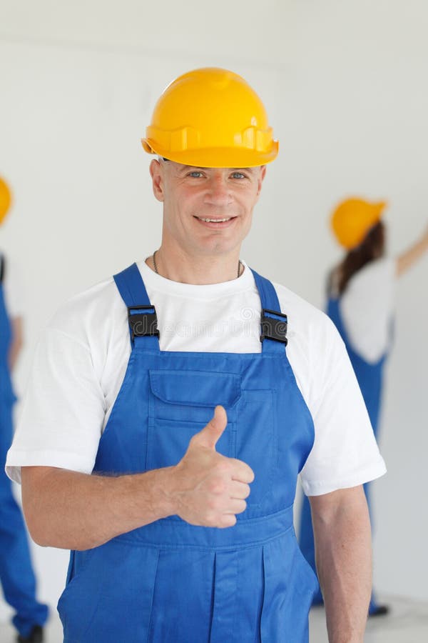 Workman gives thumbs up stock image. Image of holding - 57863463