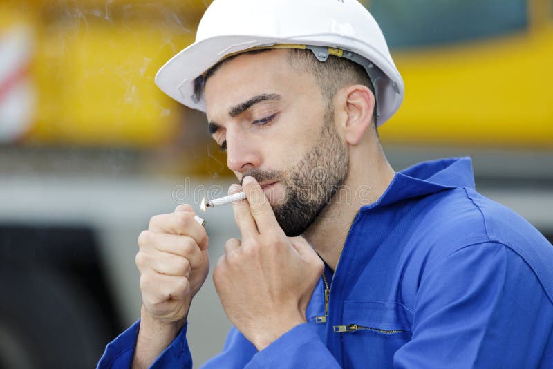 Workman Having Break and Smoking Cigarette Stock Image - Image of site ...