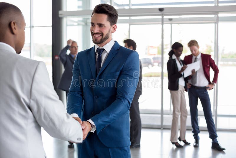 Workman Heartily Welcome Black Man Stock Image - Image of male, lobby ...