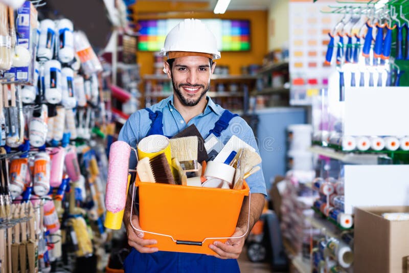 Paint Store Salesman Helping Couple Stock Photo - Image of improvement ...