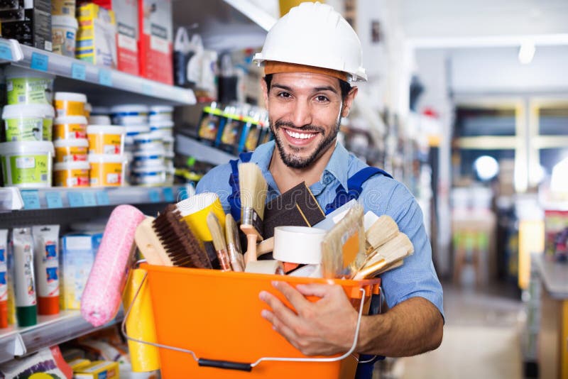 Workman Holding Basket with Picked Tools in Paint Store Stock Image ...