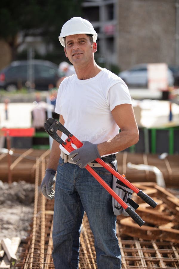 Workman Holding Metal Pliers Tool at Site Stock Photo - Image of pliers ...