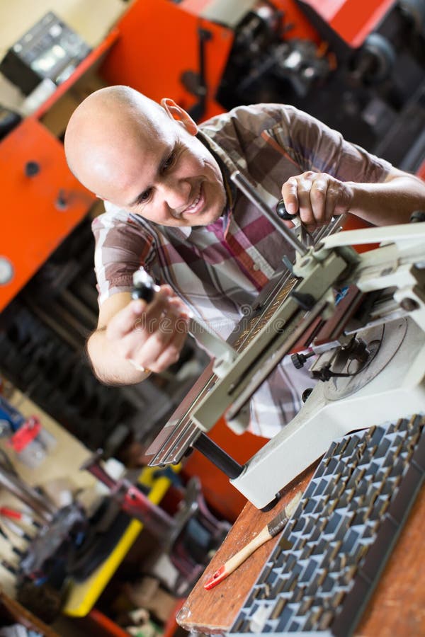 Workman Making Mailbox Plate in Workshop Stock Image - Image of ...