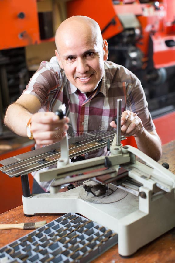 Workman Making Mailbox Plate in Workshop. Stock Photo - Image of ...