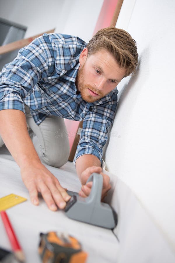 Workman Putting Down Linoleum Flooring Stock Image - Image of ...