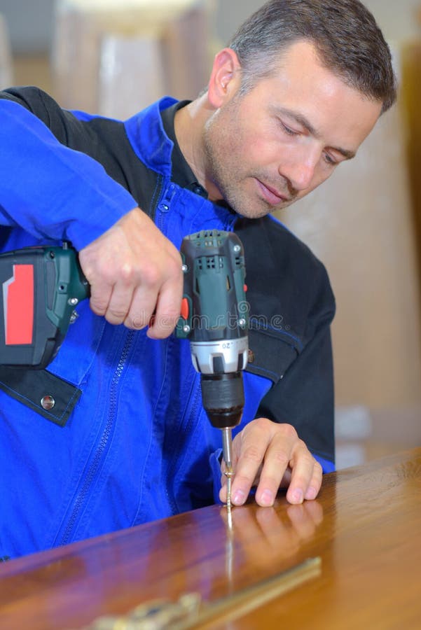 Workman Putting into Coffin Stock Image - Image of male, burial: 121236555