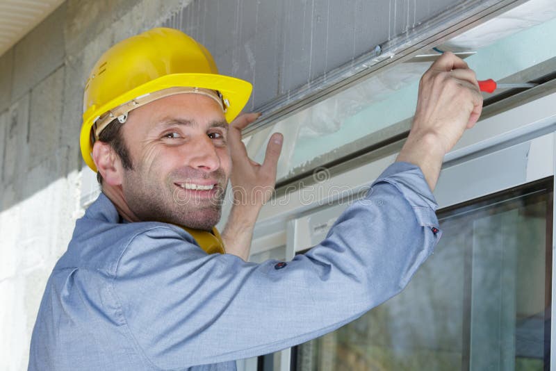 Workman Removing Protective Plastic from Fascia Board Stock Image ...