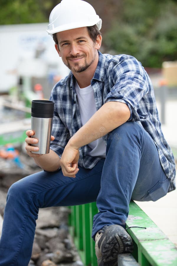 Workman Sitting Relaxing Drinking Coffee Stock Image - Image of ...